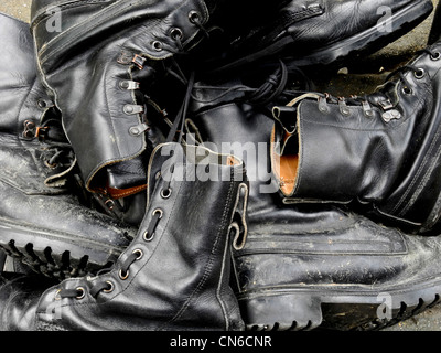 A pile of old boots Stock Photo - Alamy