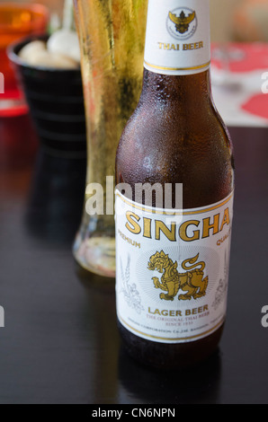 A glass of cold Singha beer in Thailand Stock Photo - Alamy