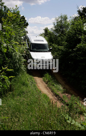 Range Rover drives over uneven, hilly conditions Stock Photo - Alamy