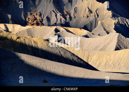 The eroded shale badlands of North Caineville Mesa in Utah's San Rafael ...