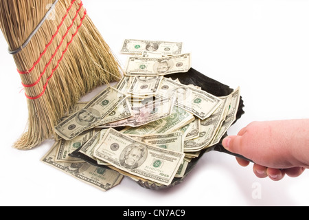 Sweeping up American Money Stock Photo - Alamy