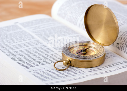 Compass on a Bible Stock Photo - Alamy