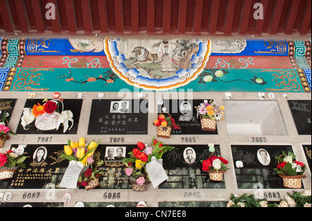 Beijing, Wanan cemetery. Graves with many flowers during the Chinese ...