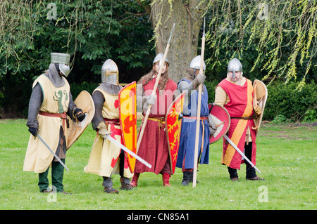 "History in action" re-enactment. Five knights in a defensive stance ...