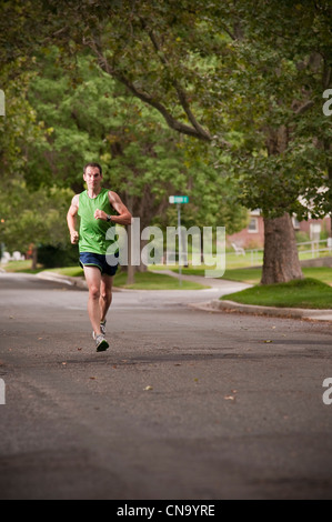 Man running on dirt path Stock Photo - Alamy