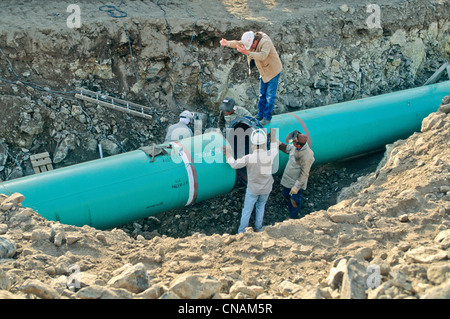 WORKERS INSTALLING NATURAL GAS LINE INTO RESIDENTIAL HOME Stock Photo ...