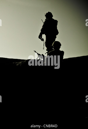 Spc. Thomas White, infantryman and Sgt. Shane Ehrlich, team leader ...