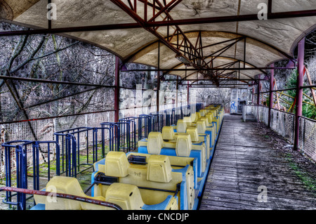 An abandoned roller coaster train in the funfair in Treptower Park (aka ...