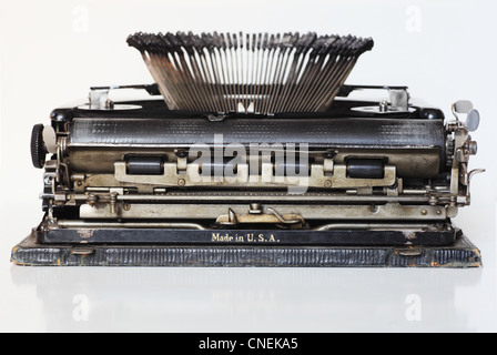 Ancient portable typewriter over white background, back view Stock ...