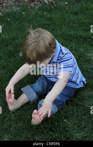 A Boy Touching His Toes Stock Photo: 29827946 - Alamy