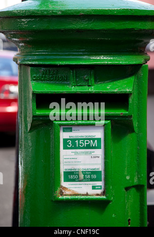 green an post irish postal service delivery van in small rural town ...