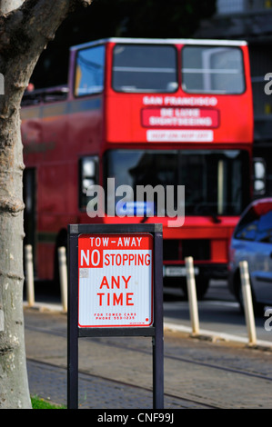 Red bus with No stopping at any time sign board ; London ; U.K Stock ...
