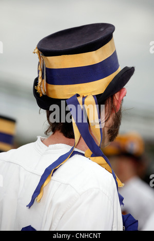 Traditional morris men wearing top hats and tatter jackets in various ...