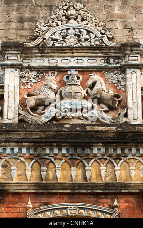 Detail of a coat of arms carved into the rock in the medieval ruins of ...