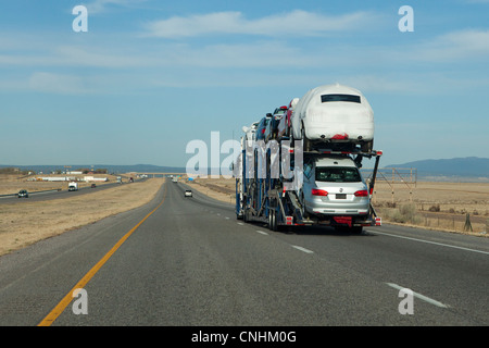 Rear view of semi truck on highway Stock Photo - Alamy