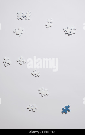 Pieces of jigsaw puzzle on color background Stock Photo - Alamy