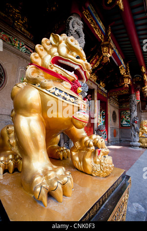 Golden chinese guardian lion or shishi statue from Ming dynasty era, at ...