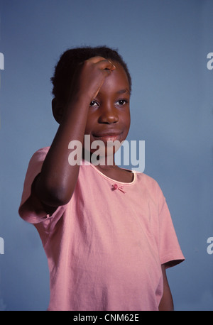 Girl with a cross sign on the forehead during kidane mehret orthodox ...