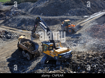 Plant working at Roan Edge Quarry. New Hutton, Cumbria, England United ...