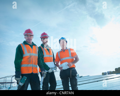 worker on roof Stock Photo - Alamy
