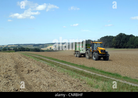 Tractor liming a field, Germany, Europe Stock Photo - Alamy