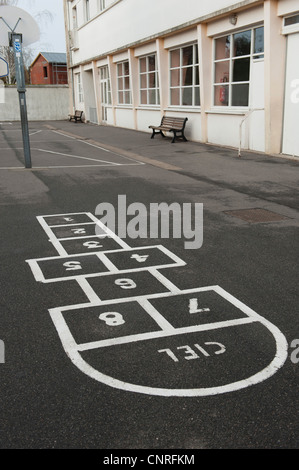 Numbers on a hopscotch grid on a playground floor Stock Photo - Alamy