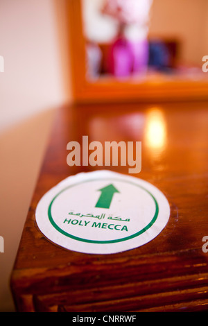 Arrow with Mecca direction Stock Photo - Alamy