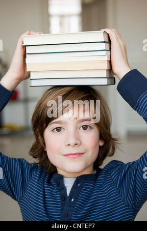 children balancing a book on their head Stock Photo - Alamy