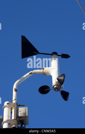 Wind-monitoring meteorological mast (met mast) with data logger being ...