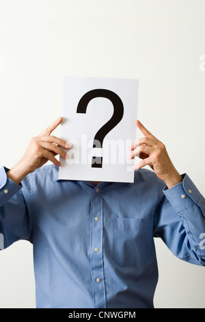 Question mark face, mysterious man wearing a hood does not see his face ...
