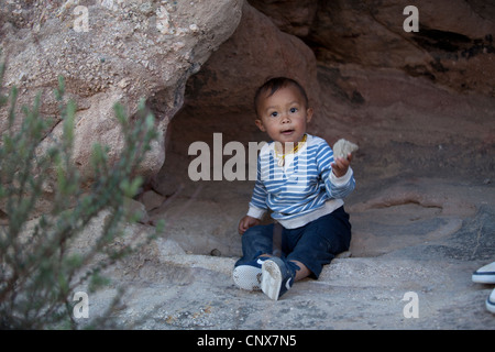 A child discovering rocks in the canyon Stock Photo - Alamy