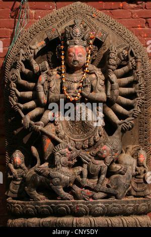 Stone carving of Hindu deity Ugrachandi in Durbar Square in the ...