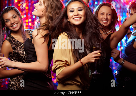 Beautiful girls having fun at a party in nightclub Stock Photo - Alamy