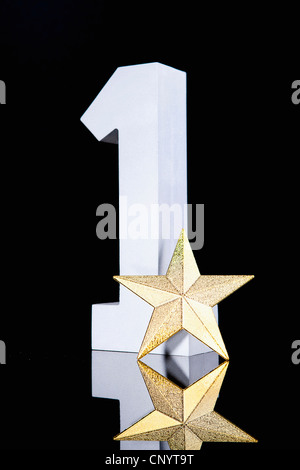 The gold star and number one Stock Photo - Alamy