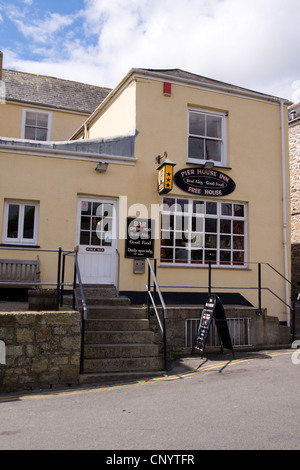 Charlestown harbour and pub, Cornwall, England, UK Stock Photo - Alamy