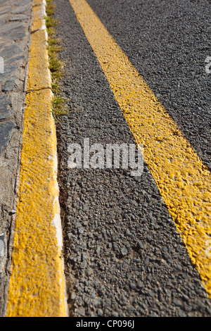 double yellow lines road and no loading kerb pavement markings in Stock ...