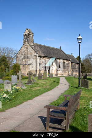 A bench in St. John the Baptist churchyard, Cherington, Warwickshire ...