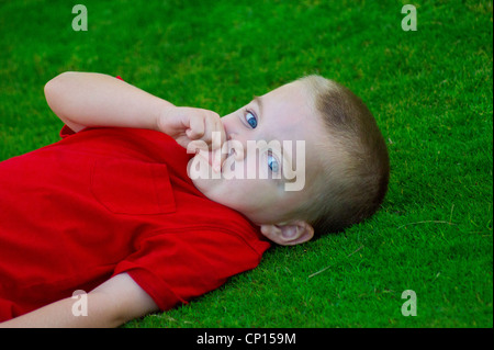 A four year old autistic boy posturing because of all the excitement ...