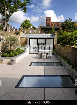 Garden view of house extension by Paul Archer Design near Hampstead ...