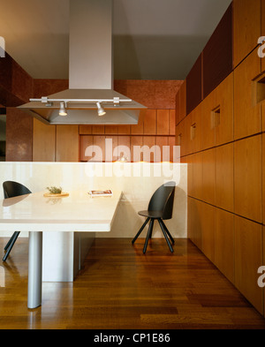 Extractor fan over island unit in modern kitchen in Spanish villa Stock ...