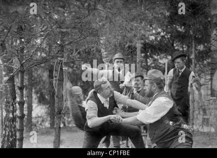 Group of people fighting Stock Photo - Alamy