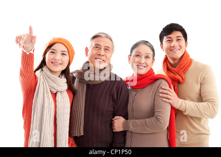 Family members looking afar and pointing the front Stock Photo - Alamy