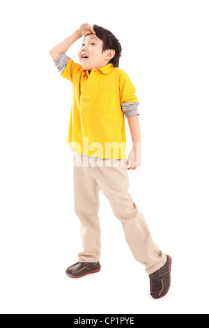 Cute boy looking afar Stock Photo - Alamy