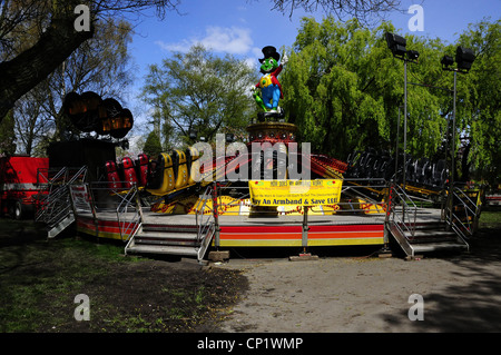 Small fairground ride in local park Stock Photo - Alamy