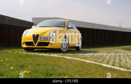 Yellow Alfa Romeo Mito on location Stock Photo - Alamy
