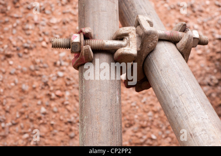 Scaffold connectors joining scaffolding poles together Stock Photo - Alamy