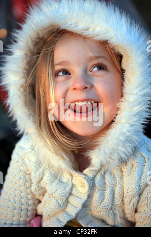 cheeky face of three years old girl Stock Photo - Alamy