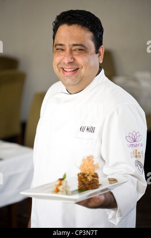 Chef Manish Mehrotra with a dish of duck chettinad and umpa barrels at ...