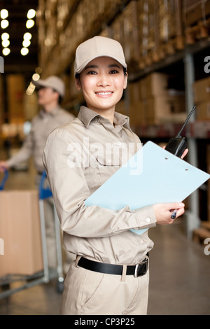 Beijing, China - Chinese female workers weeding a field on a farm near ...