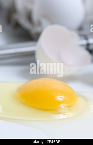 Raw Egg Cracked Open Shell Yolk Stock Photo - Alamy
